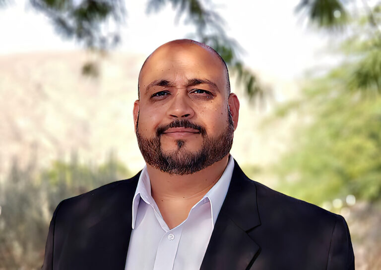 Roger Nuñez, Executive Board member from the Coachella Valley, uses his ...